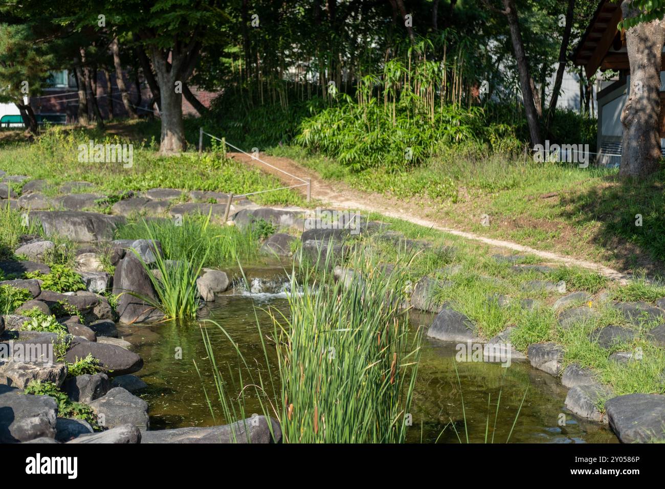 View of the pond and garden in Namsangol Hanok village, a recreated ...