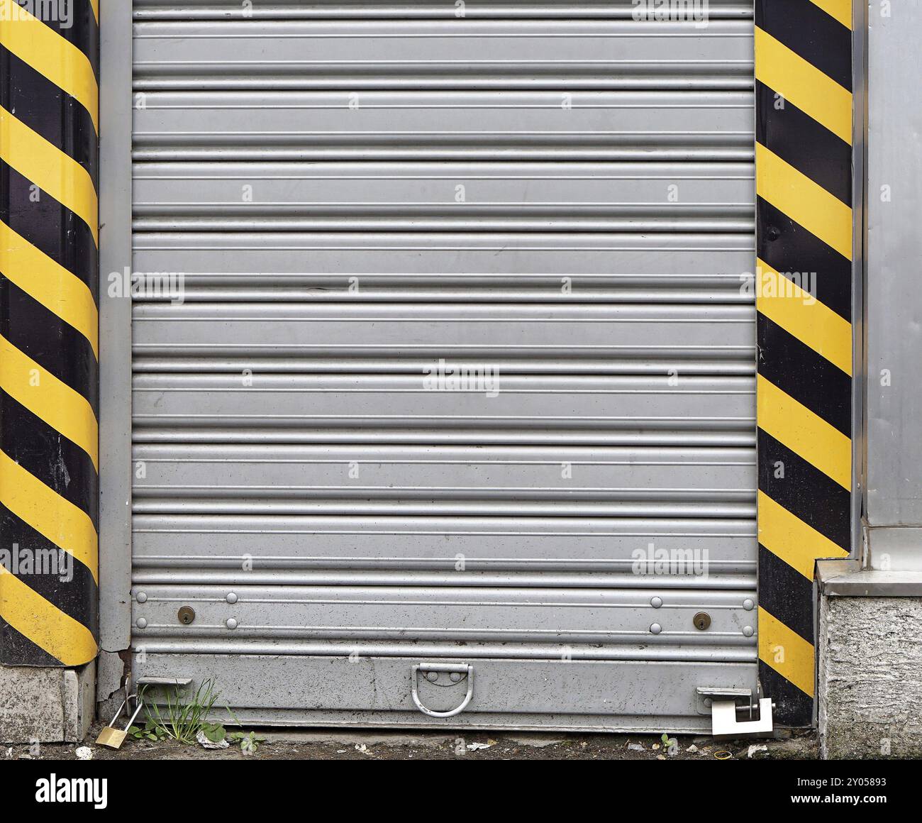 Rolling shutters at closed shop door Stock Photo - Alamy