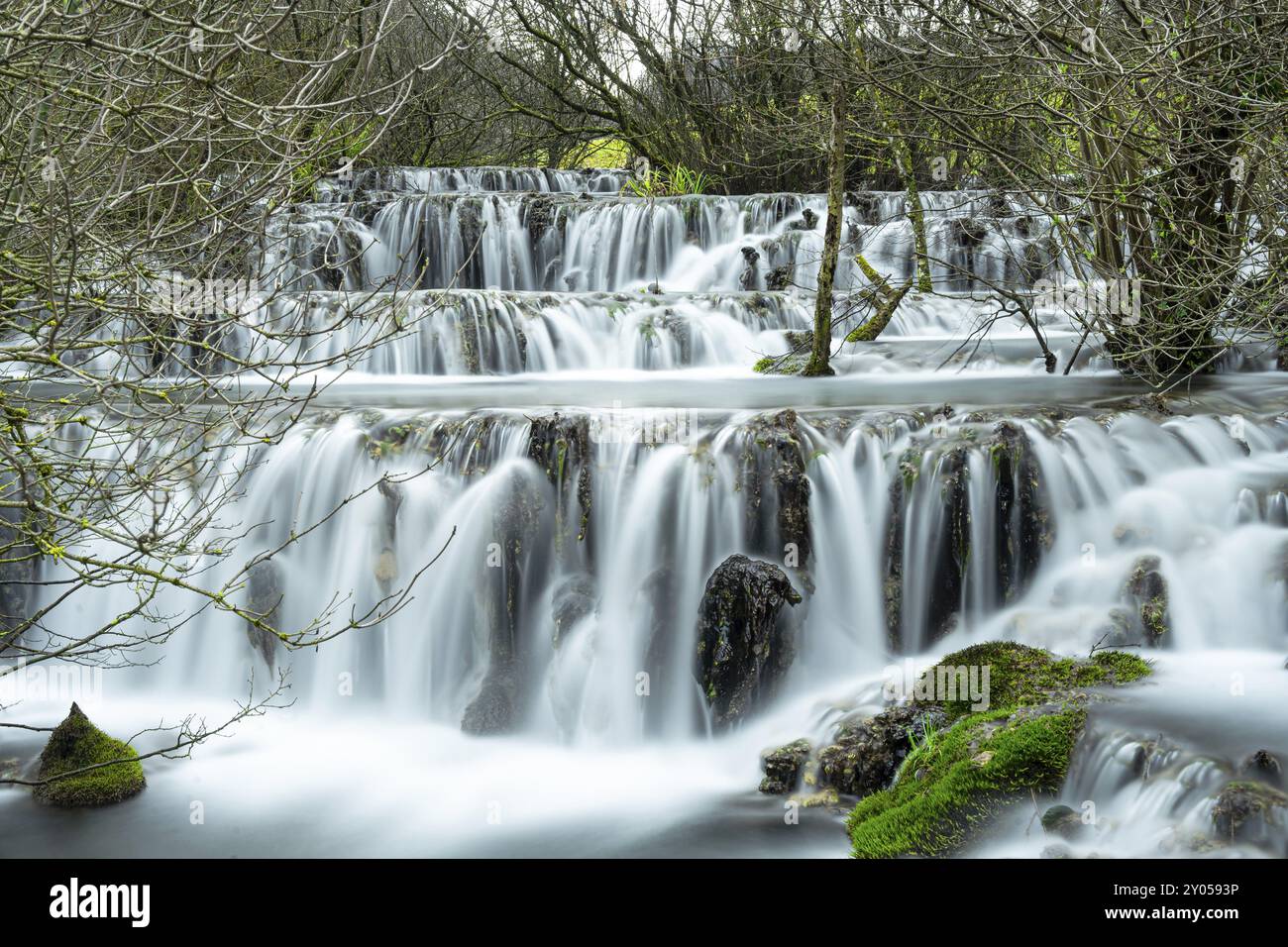 Many sinter terraces and basins have formed in the riverbed of the ...