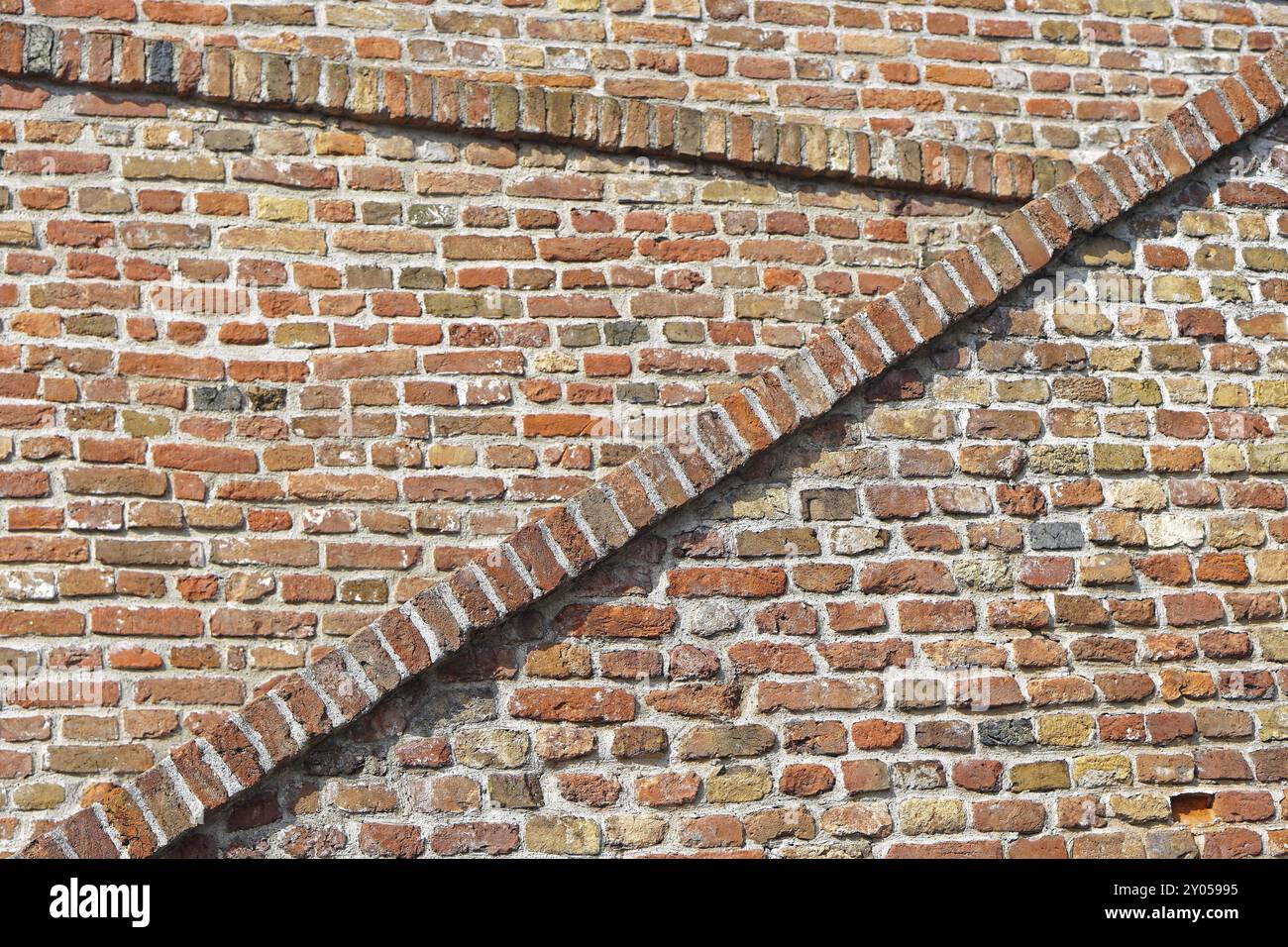 Old red brickwork walls with diagonal lines Stock Photo - Alamy