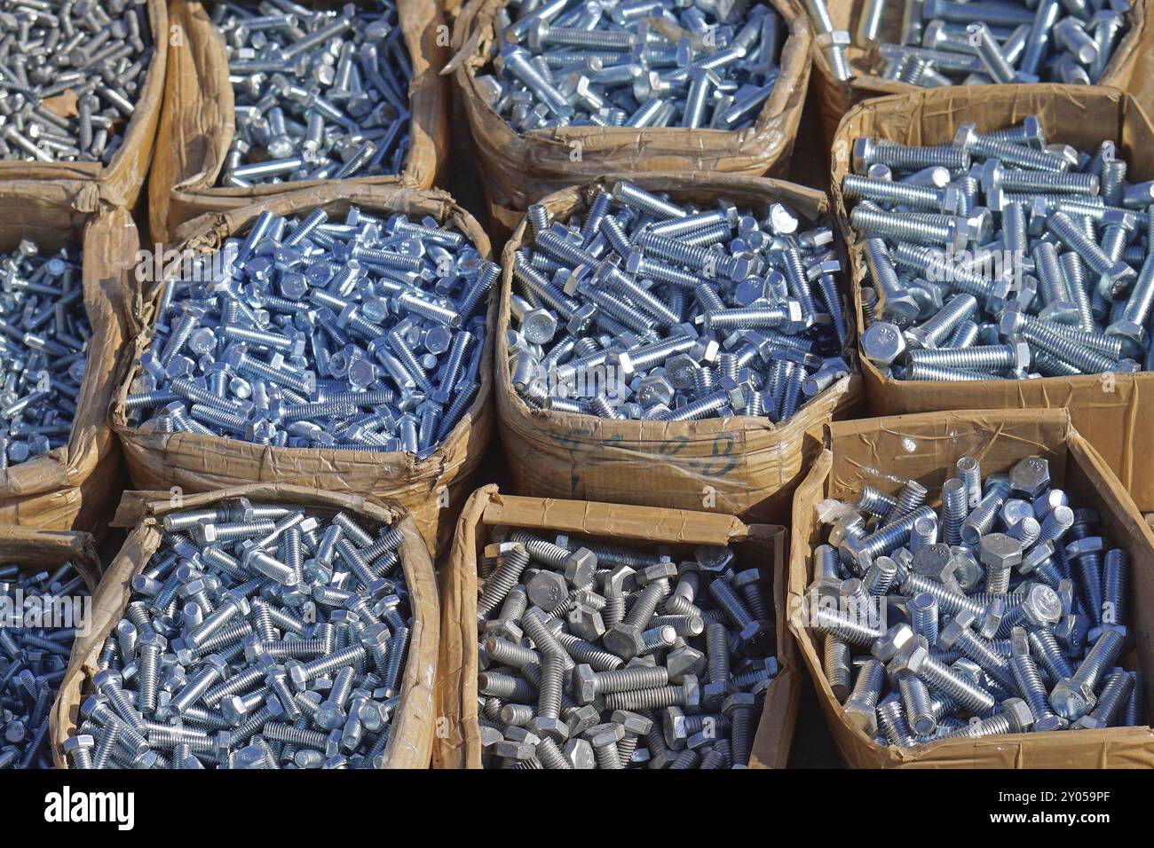 Bolts and nuts in boxes Stock Photo - Alamy