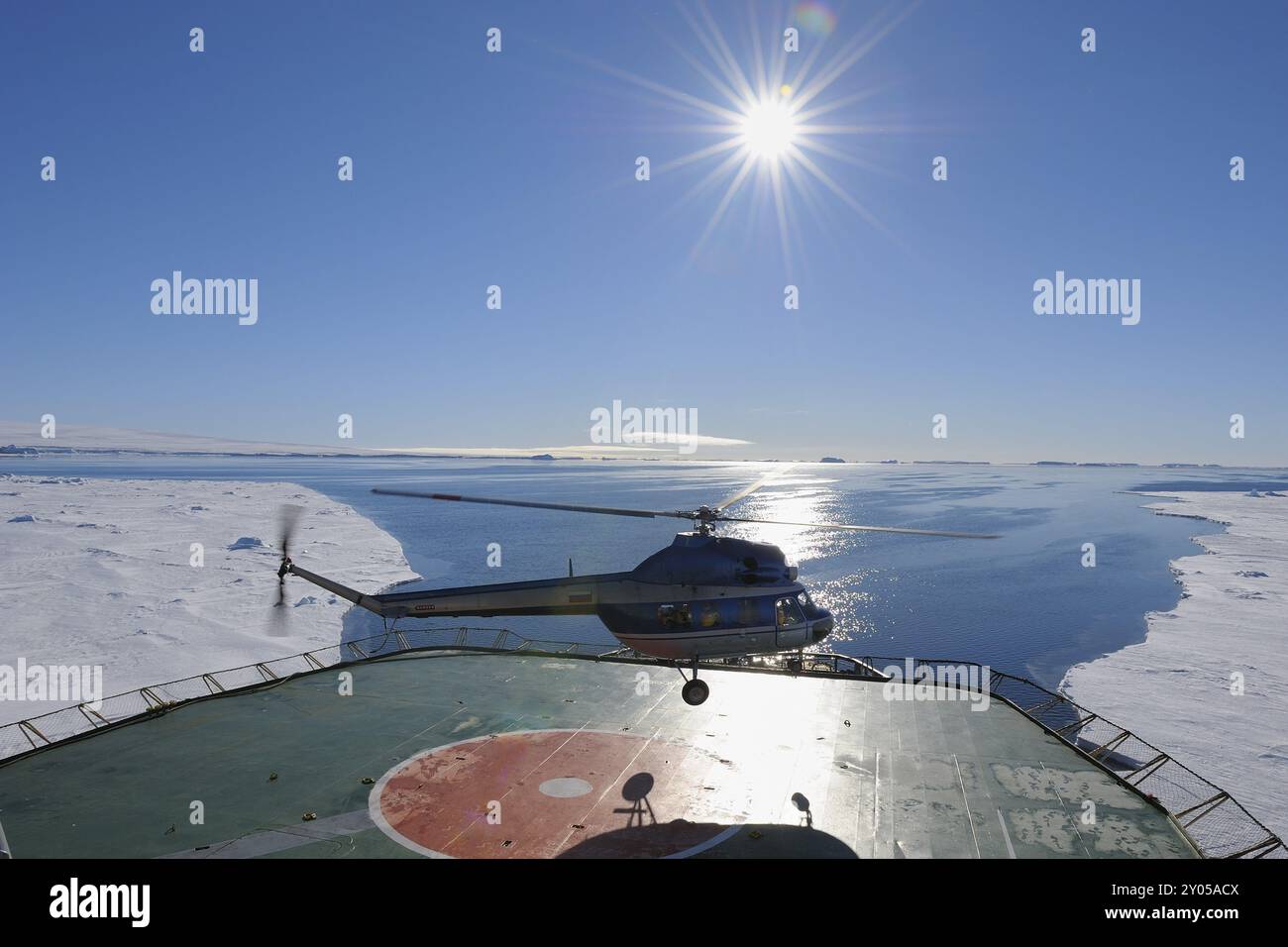 Helicopter landing on icebreaker, Snow Hill Island, Antarctic Peninsula ...