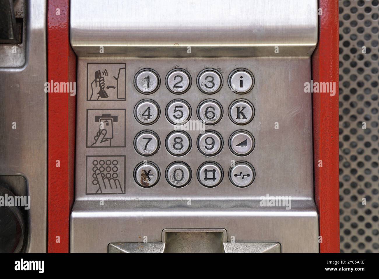 Public telephone metal keypad dial Stock Photo - Alamy