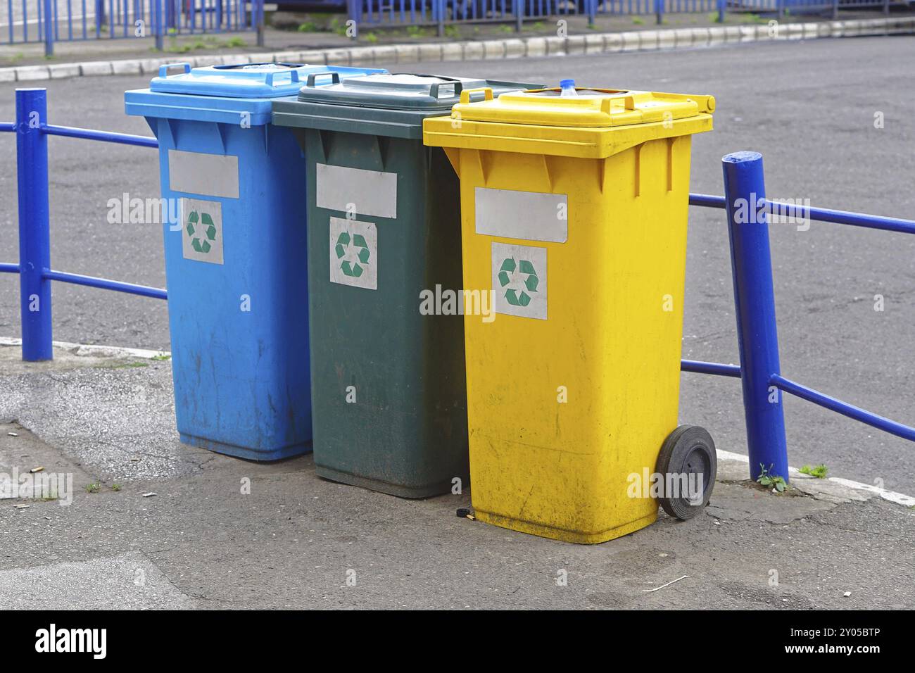 Three plastic recycling bins for sorting waste Stock Photo - Alamy