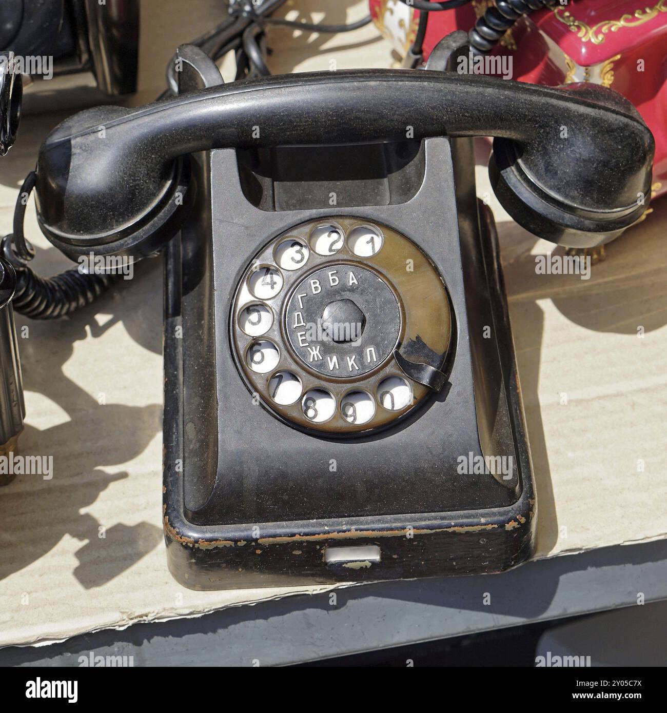 Black bakelite retro telephone at flea market Stock Photo - Alamy