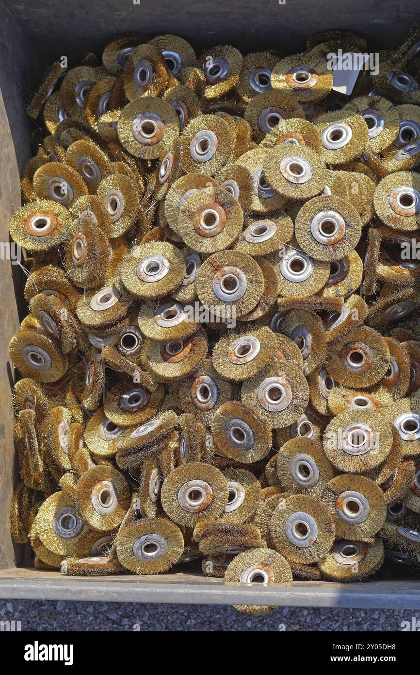Big box of brass wire wheels disc tools Stock Photo - Alamy