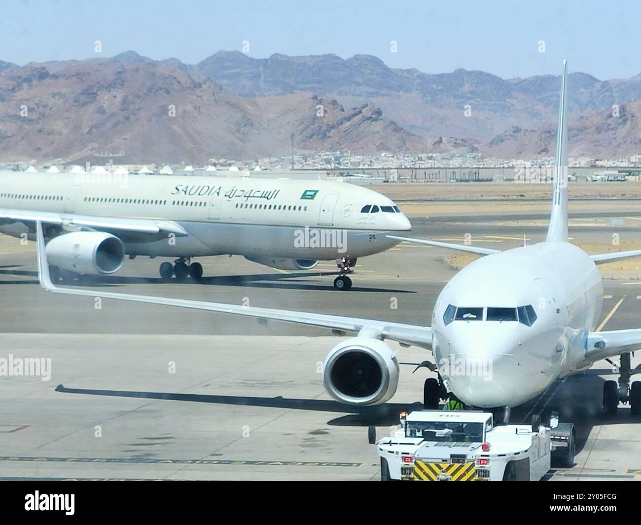 Medina, Saudi Arabia, June 29 2024: Saudi Airlines plane in Prince Mohammad Bin AbdulAziz ...