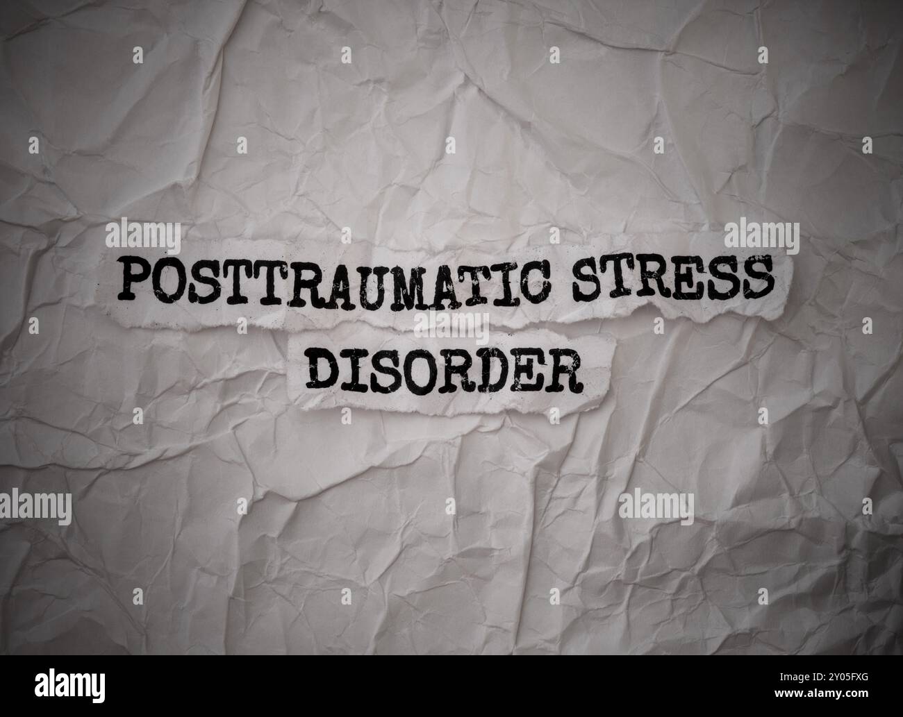 Crumpled piece of paper with words Post traumatic Stress Disorder on a ...