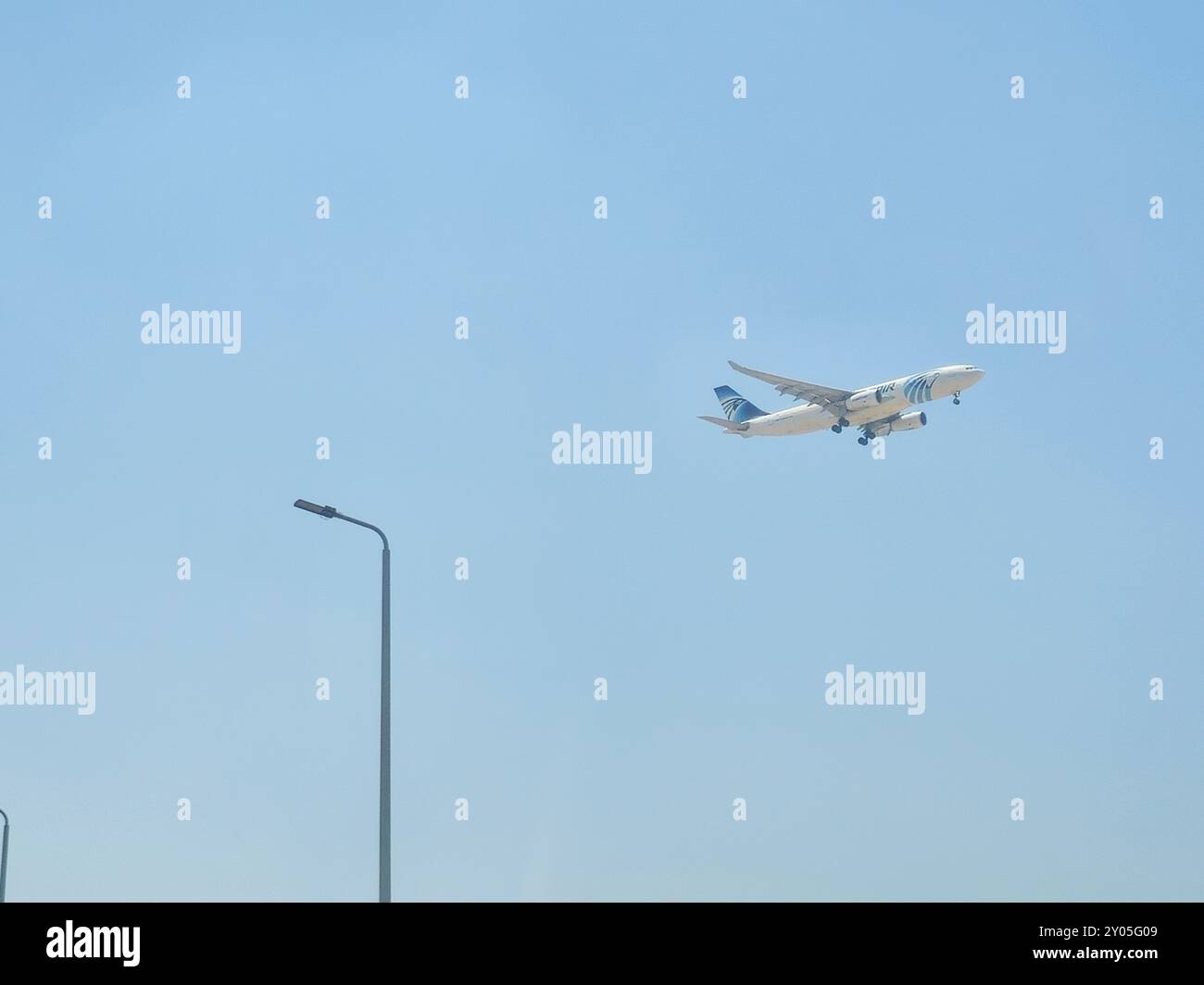 Cairo, Egypt, July 17 2024: Egyptair plane in the air, Egypt Air is the ...