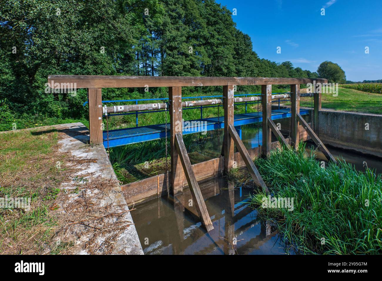 Jaz Grabownica, a weir to control the flow, at Staw Grabownica pond ...