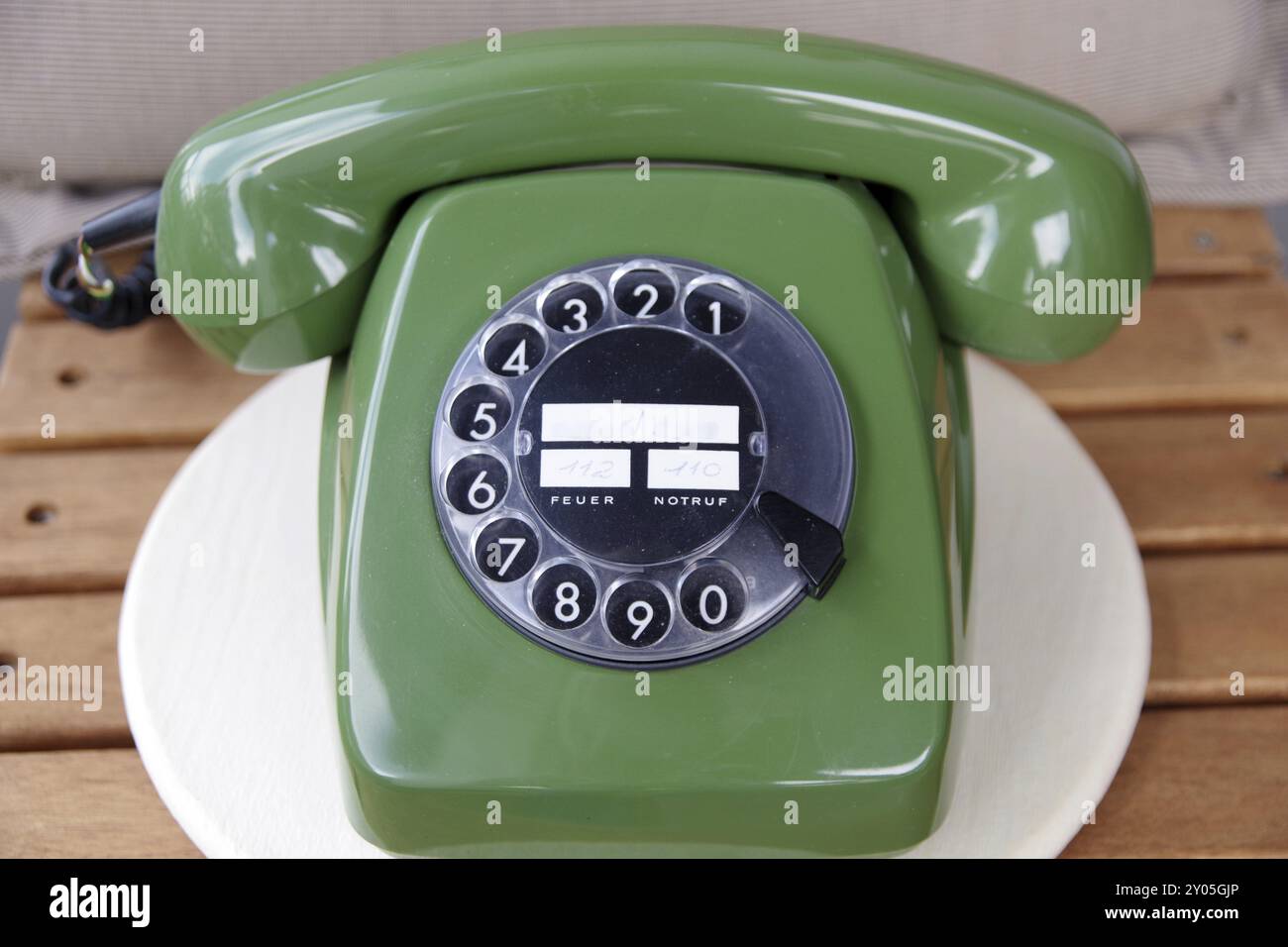 Telephone, obsolete, green, dialling disc, An antique telephone with ...
