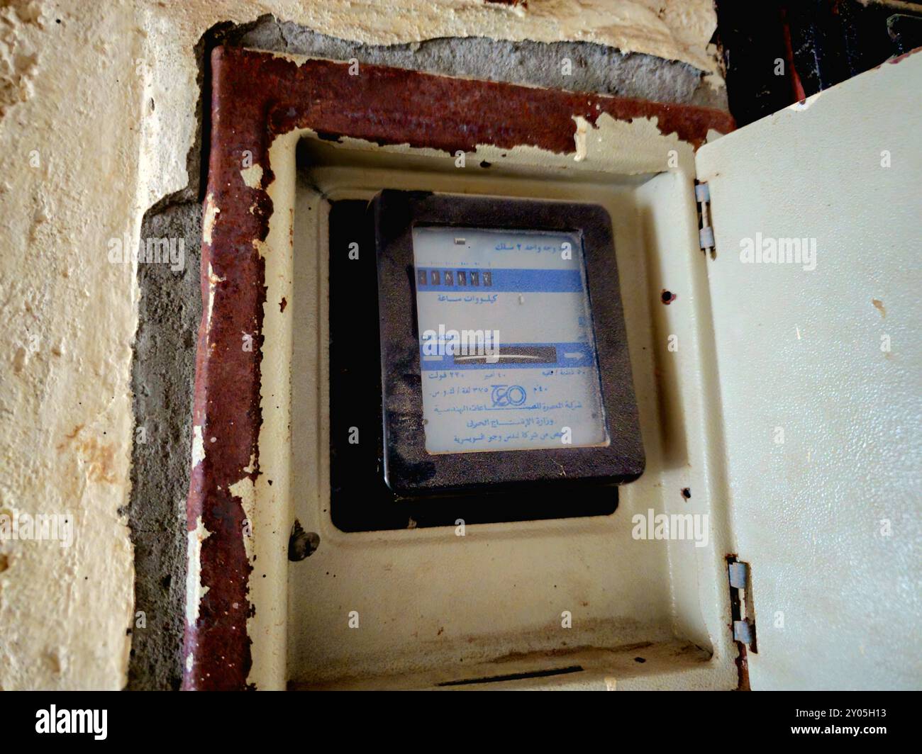 Giza, Egypt, August 2 2024: An old electricity meter, electric ...