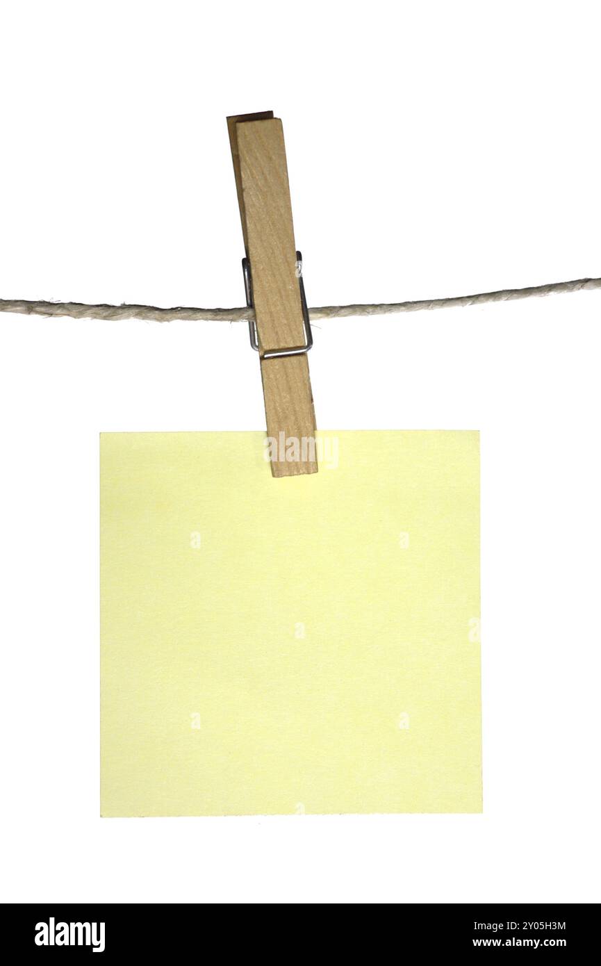 Sticky note hanging on a peg from a line Stock Photo - Alamy