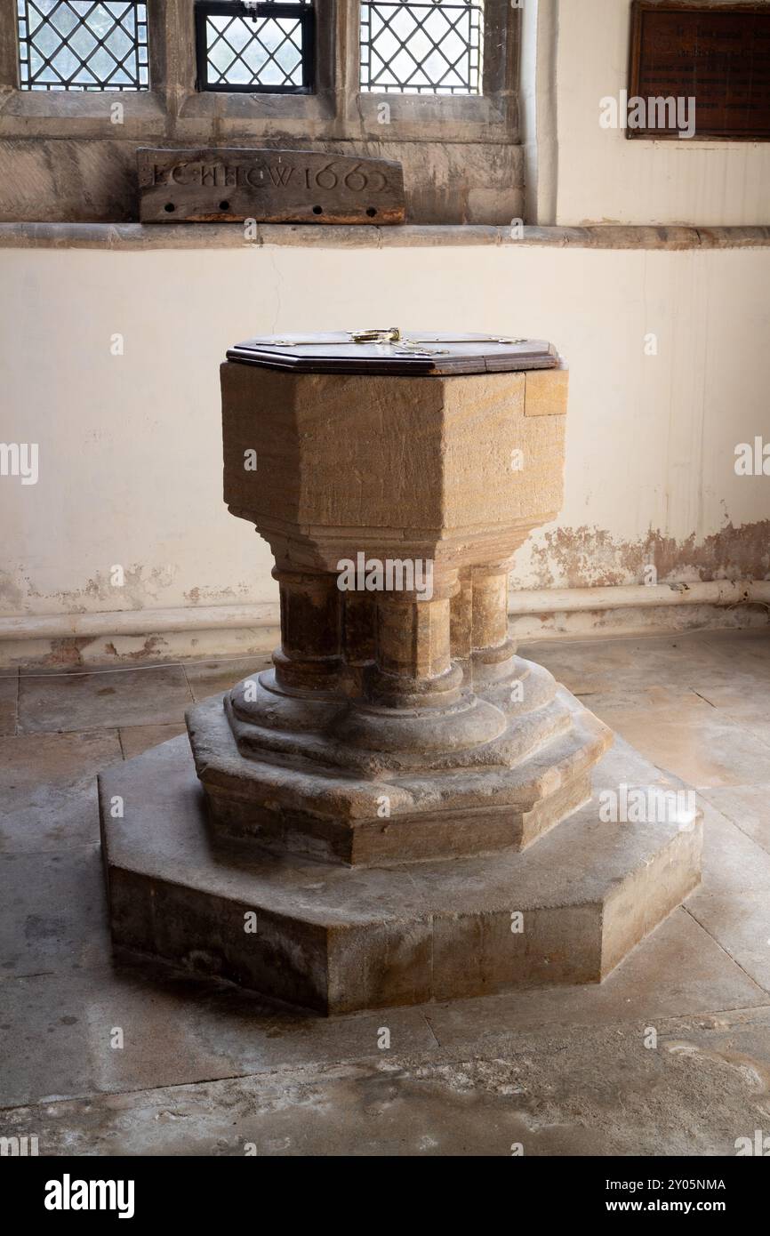 The font, St. Peter and St. Paul`s Church, Langham, Rutland, England ...