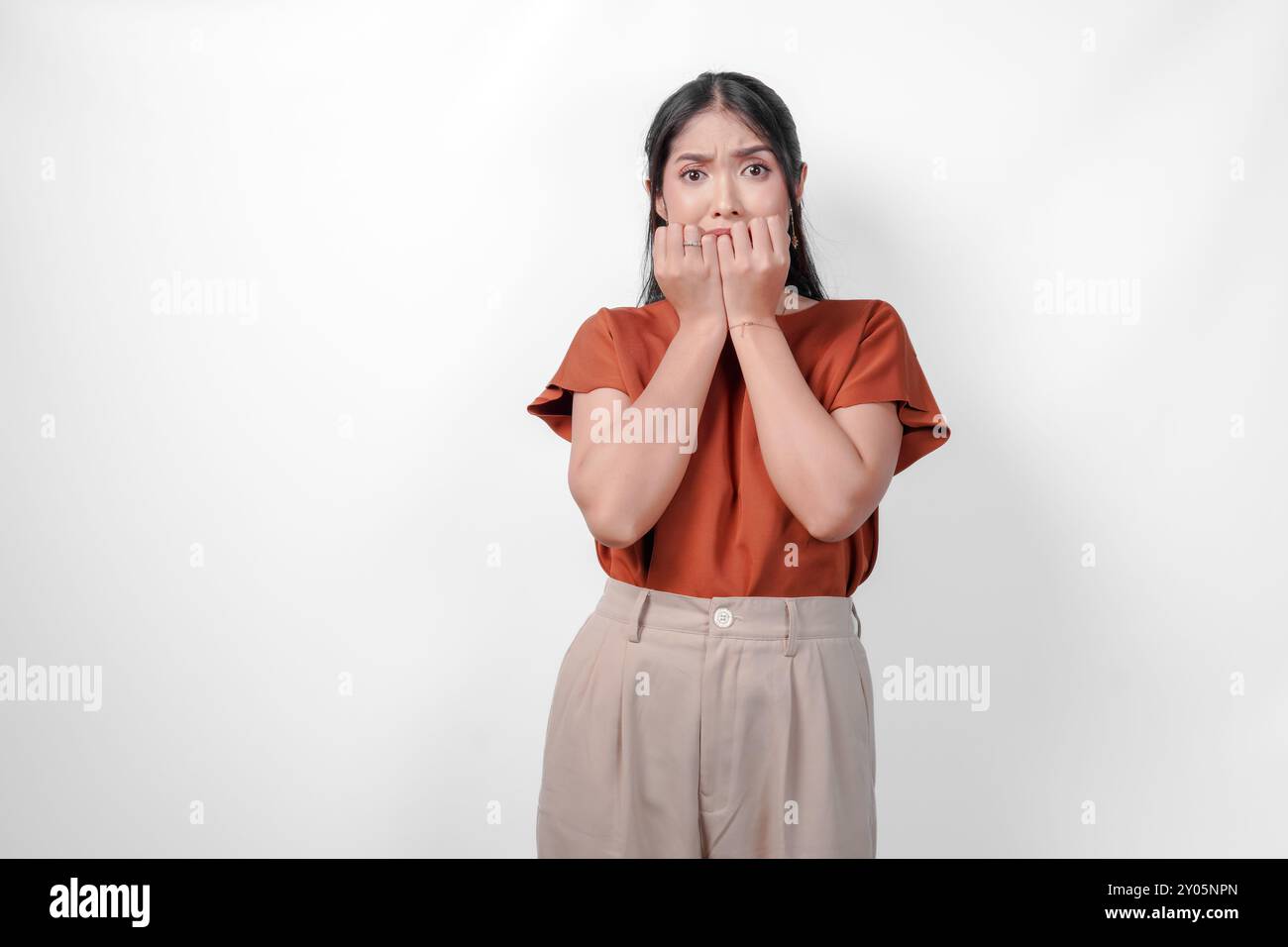 Scared embarrassed cute asian hi-res stock photography and images - Alamy