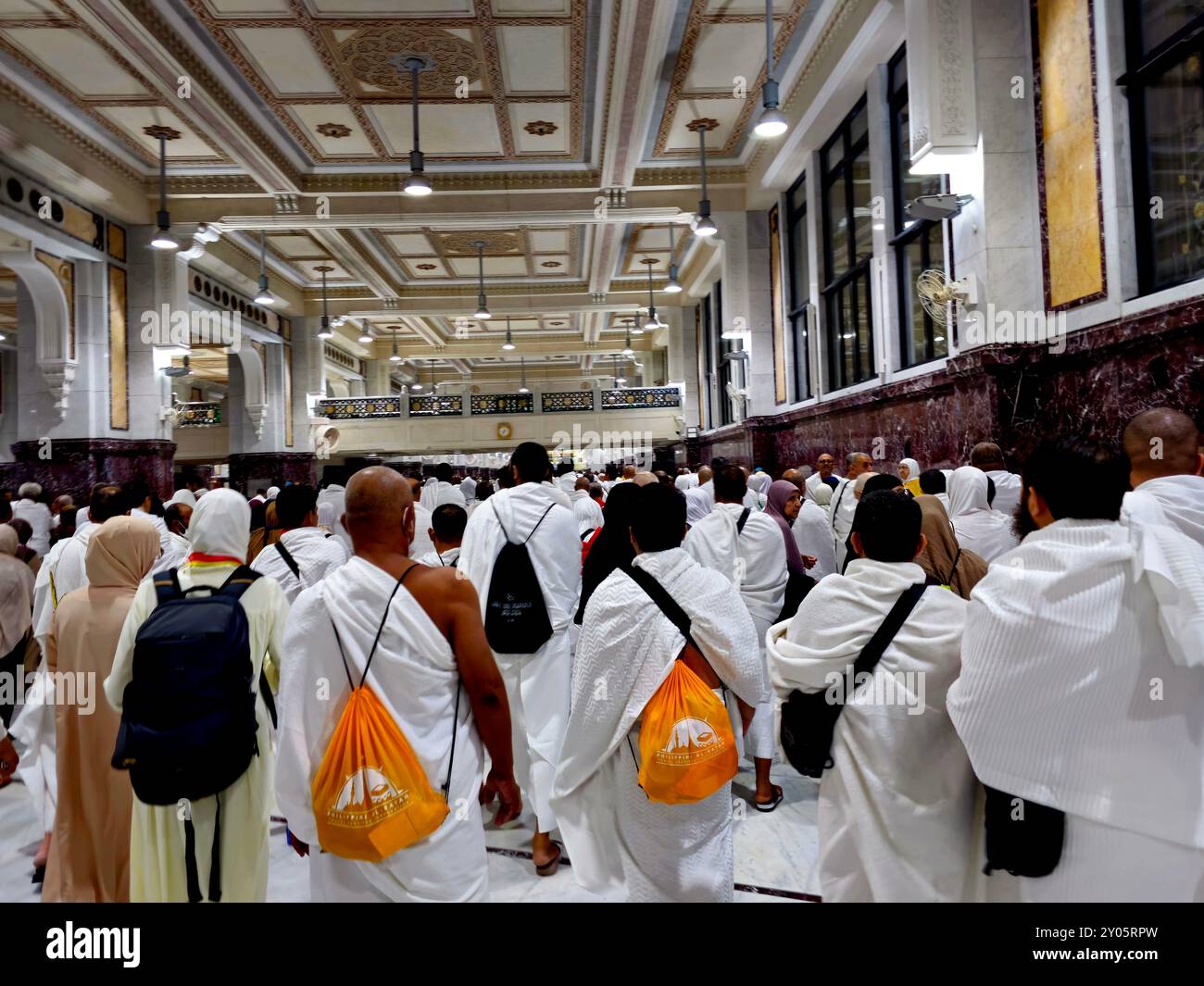 Mecca, Saudi Arabia, June 6 2024: Muslims travel back and forth between ...