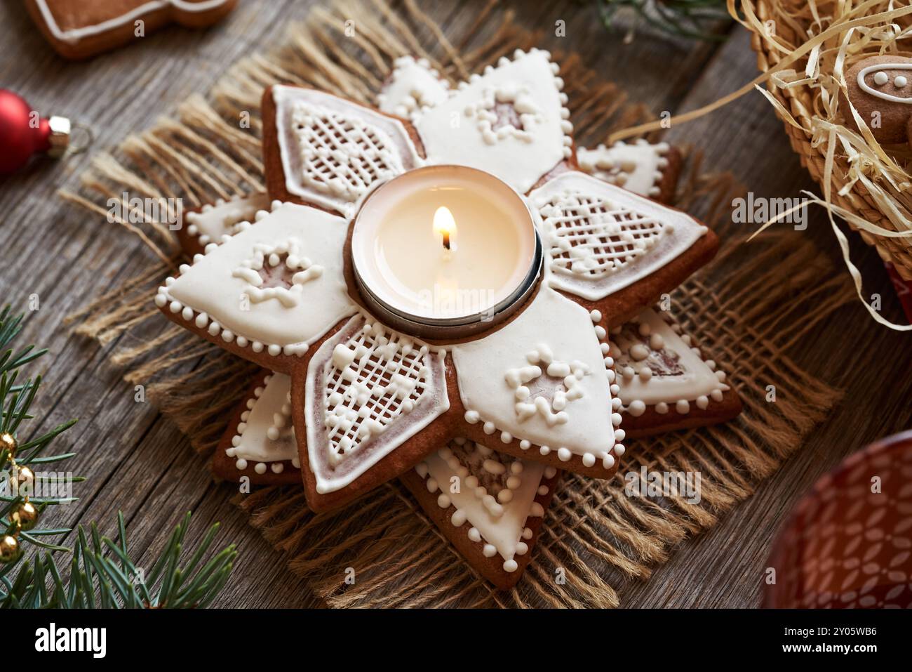 Homemade gingerbread Christmas cookies decorated with white icing in ...