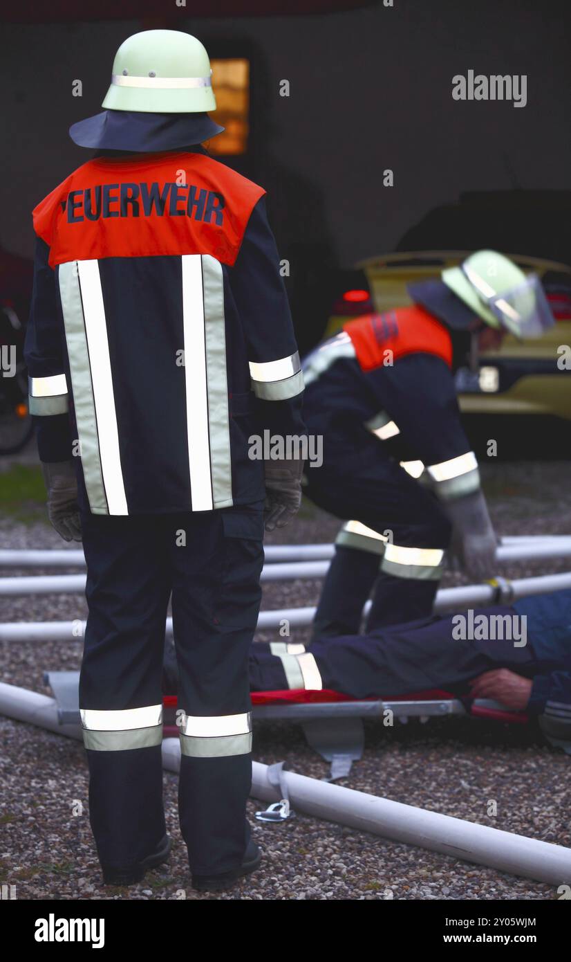 Recovery of a fire victim Stock Photo - Alamy
