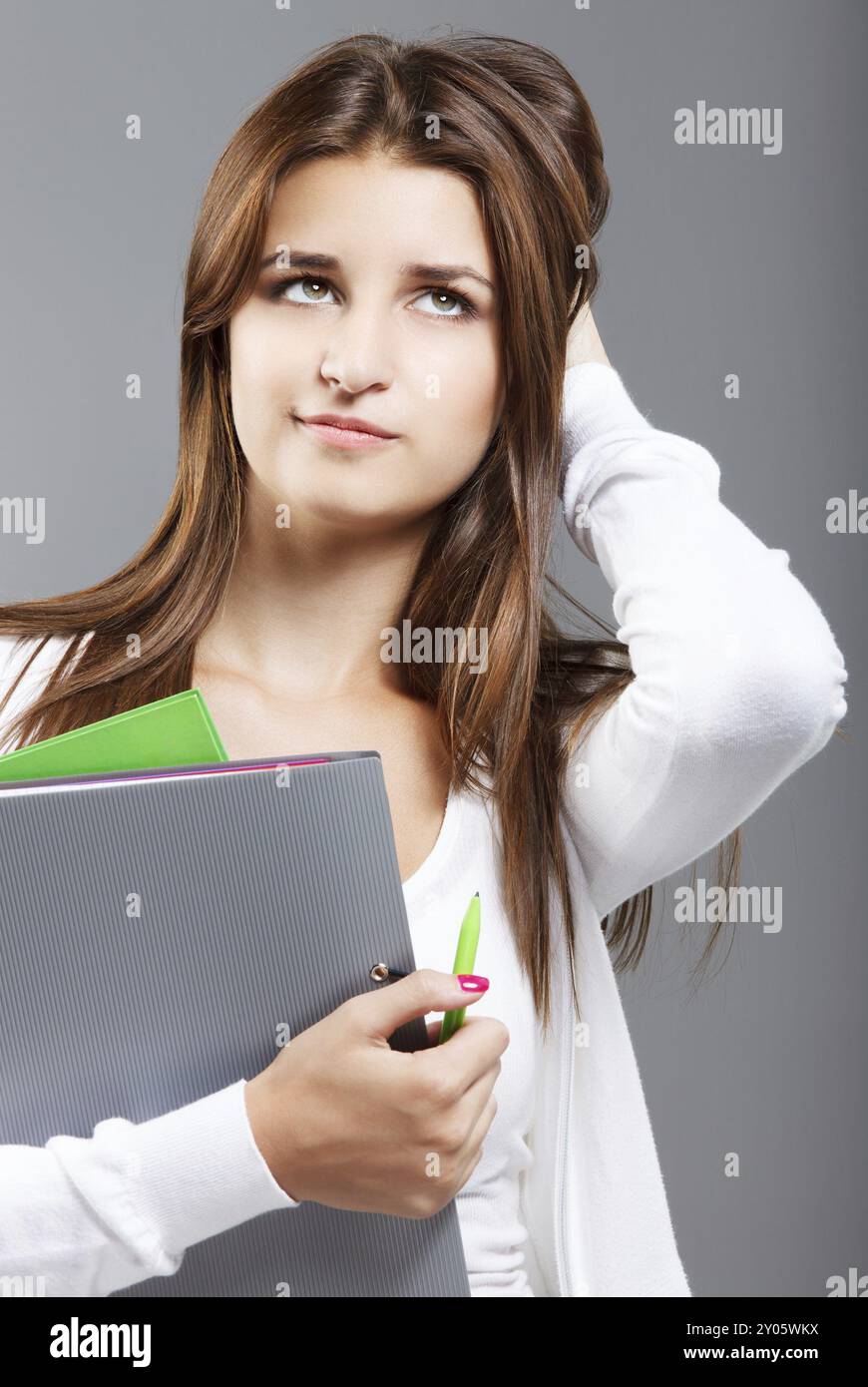 Casual dressed high school student girl thinking Stock Photo - Alamy