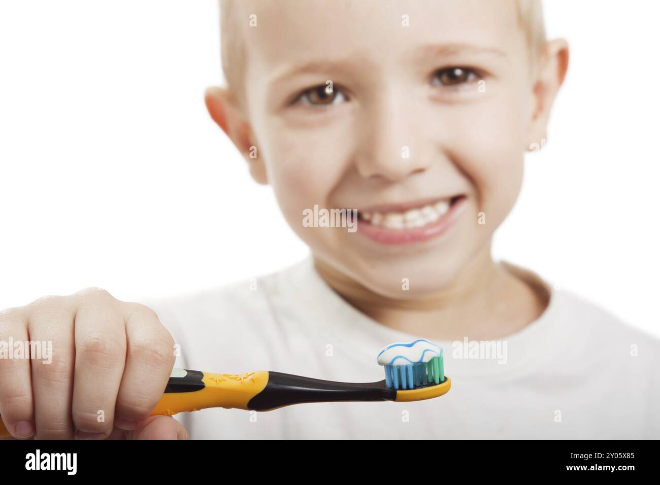 Little child with dental toothbrush brushing teeth Stock Photo - Alamy