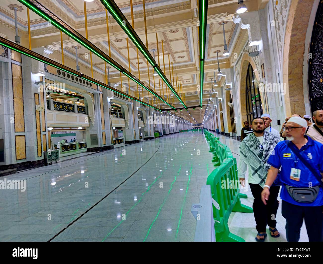 Mecca, Saudi Arabia, June 4 2024: Muslims travel back and forth between ...