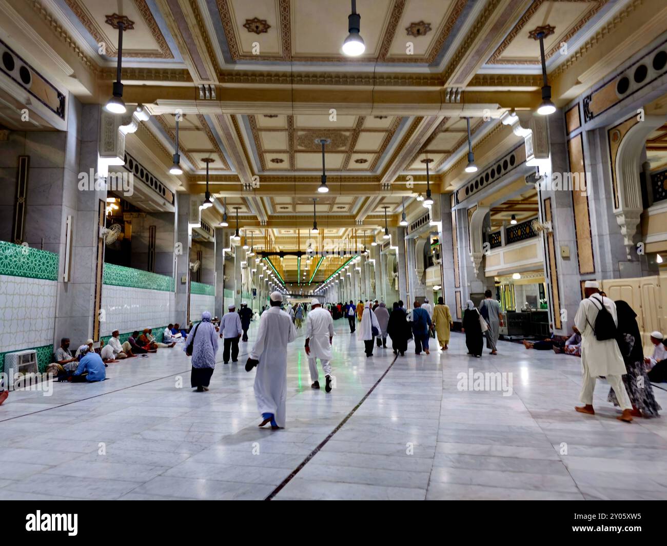 Mecca, Saudi Arabia, June 4 2024: Muslims travel back and forth between ...