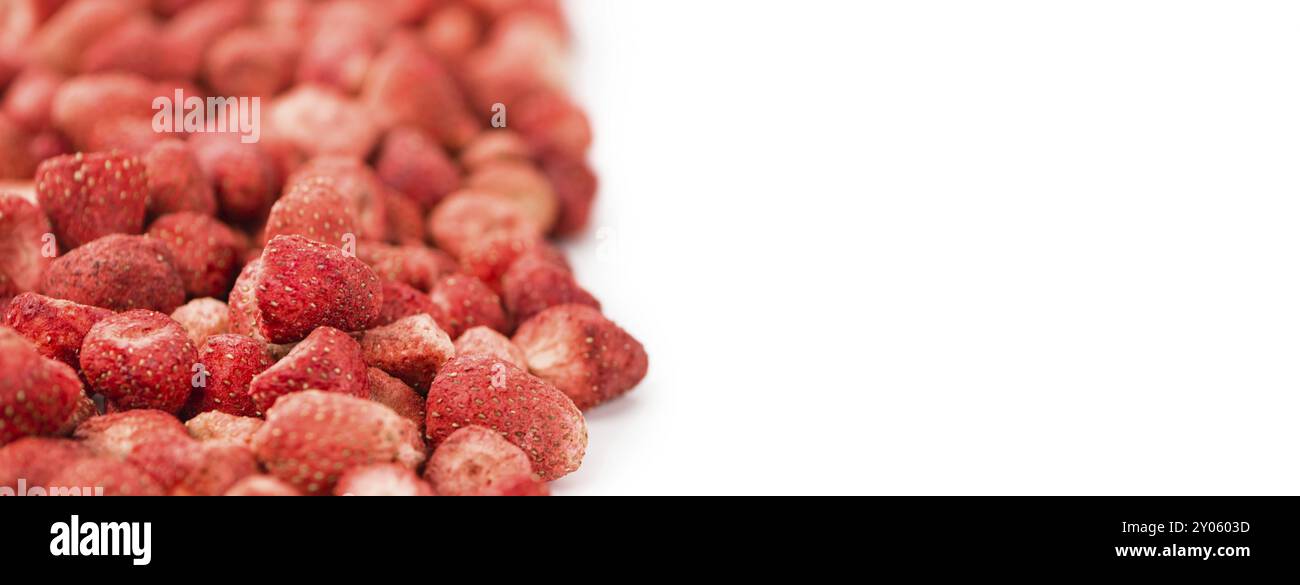 Portion of Dried Strawberries as detailed close-up shot isolated on ...