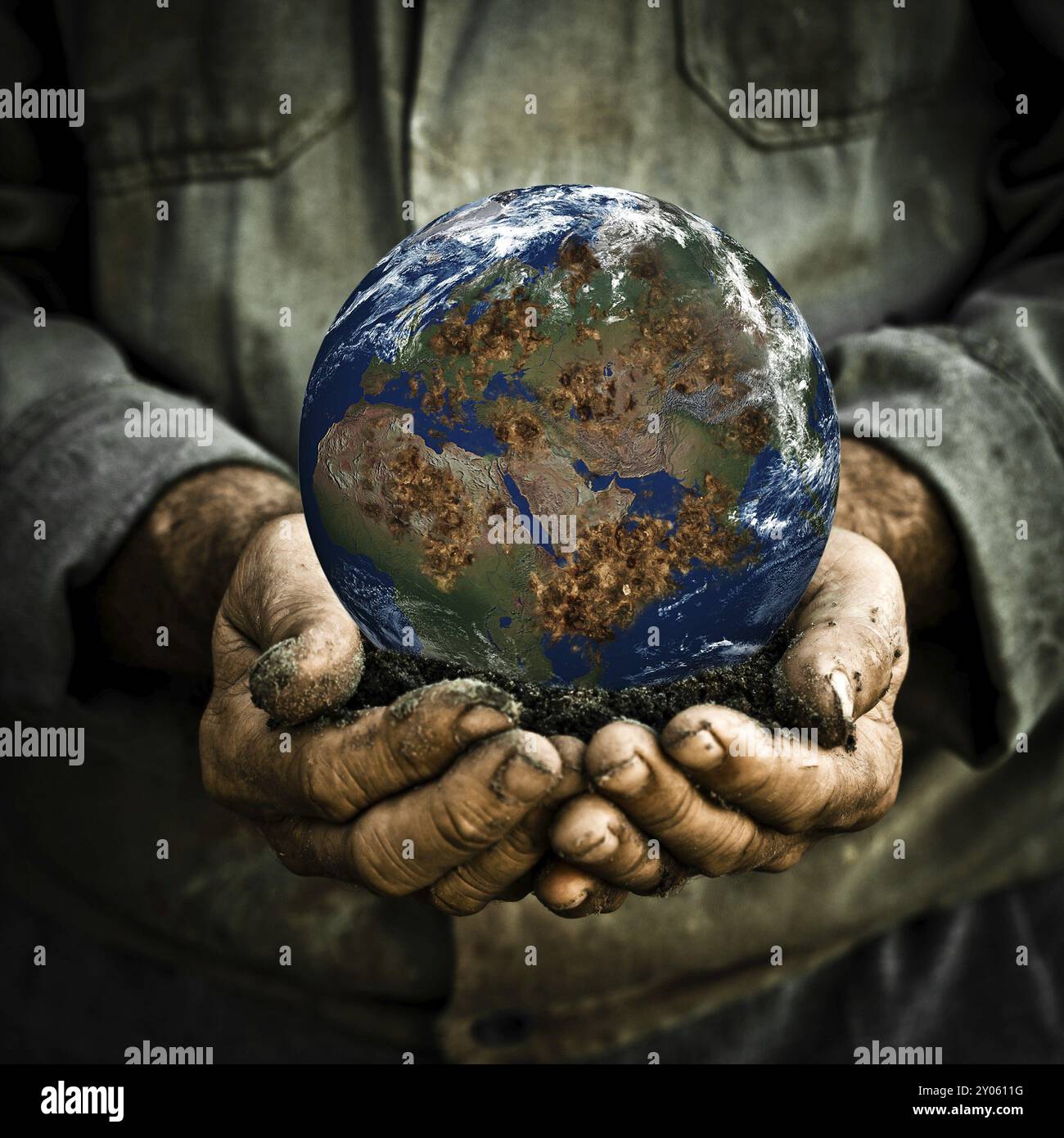 Old man holding the Earth in his hand. Ecology concept Stock Photo - Alamy
