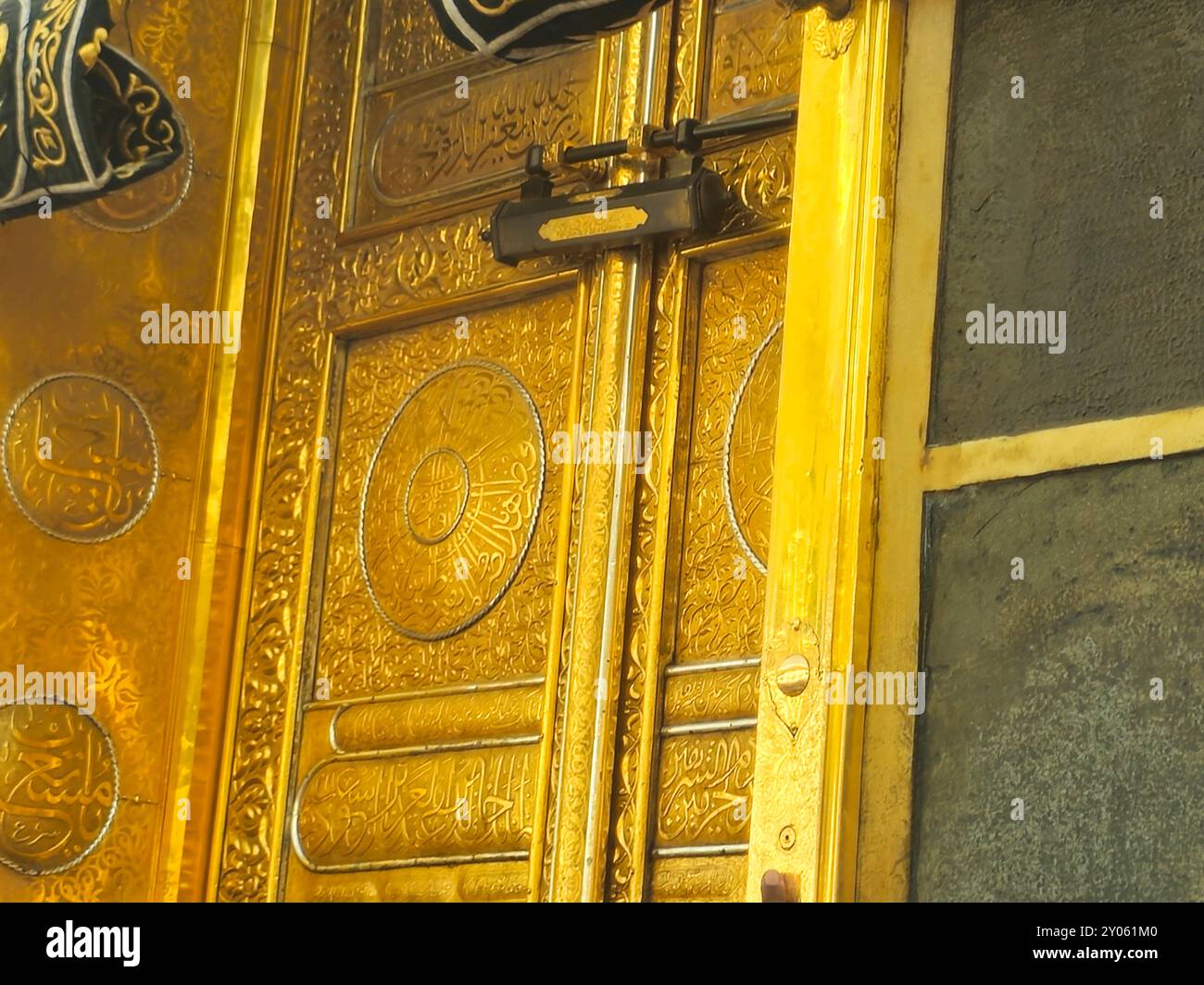The golden door of Kaaba, The Kaaba a stone building at the center of ...