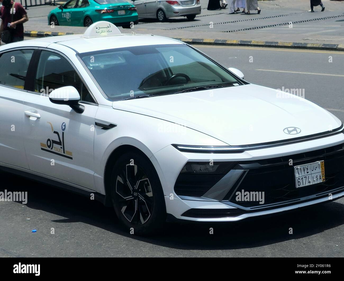 Mecca, Saudi Arabia, June 23 2024: Mecca Makkah Taxi, used to transport Hajj pilgrims inside and ...