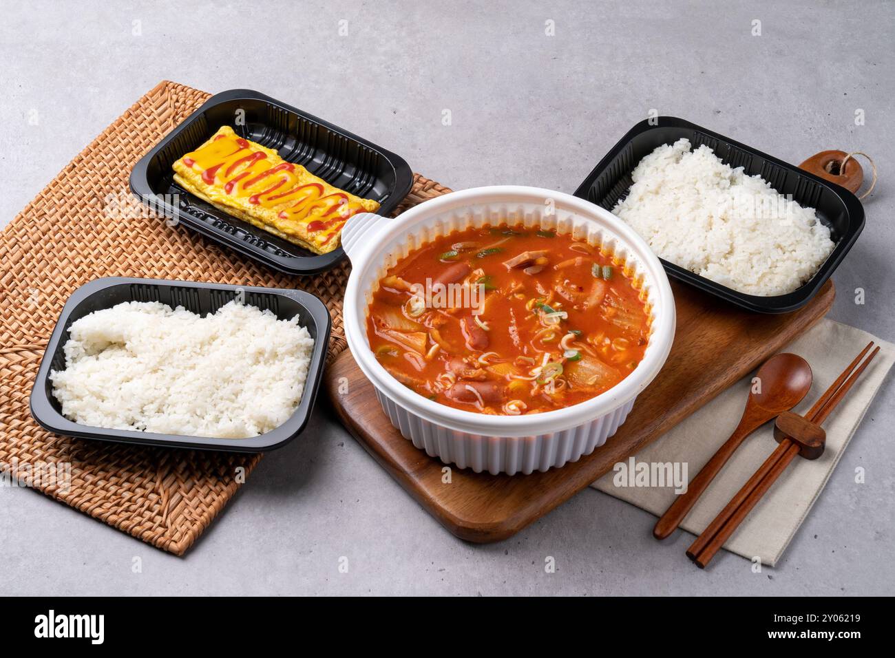 Korean food, kimchi stew, ham, soft tofu, pork, egg roll, rice, side ...