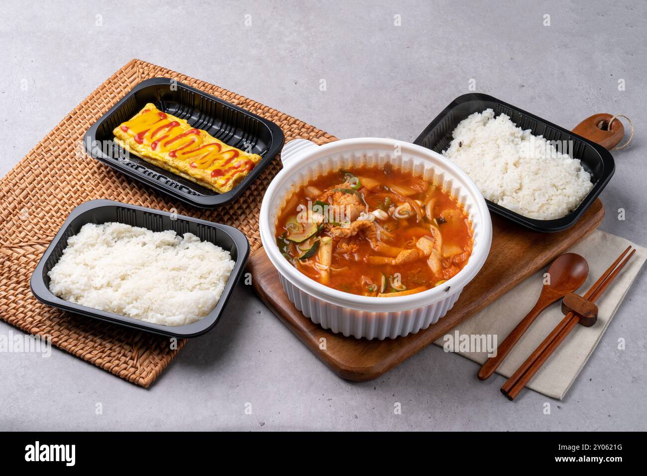 Korean food, kimchi stew, ham, soft tofu, pork, egg roll, rice, side ...