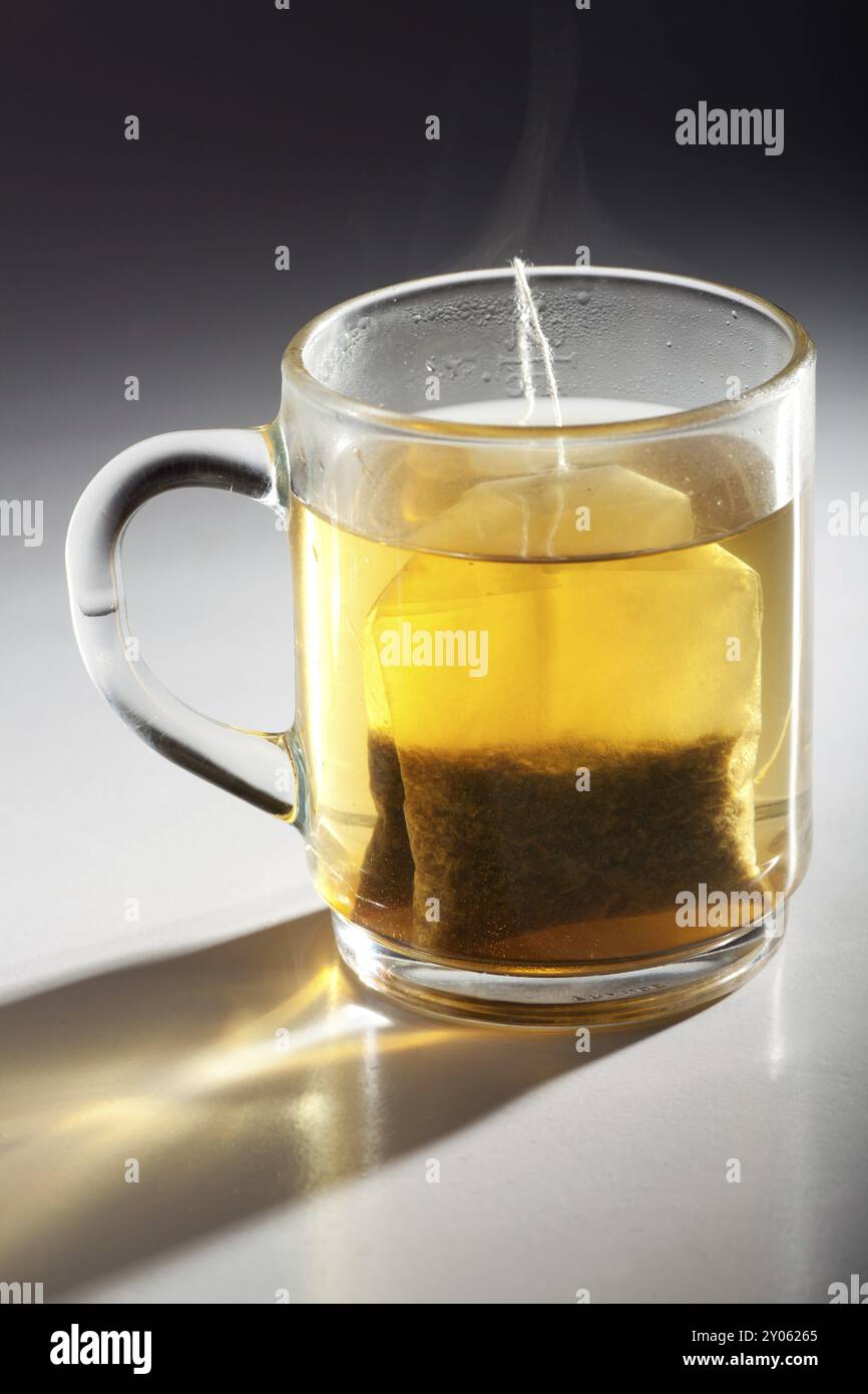 Tea bags in a glass cup Stock Photo - Alamy