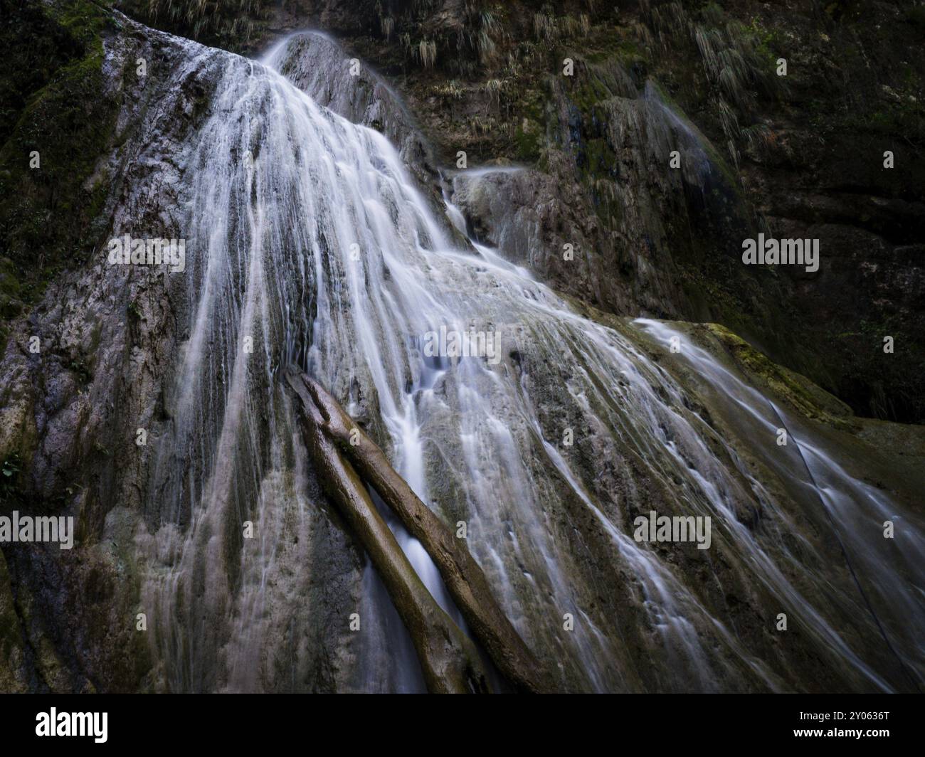 Santa Cruz, BOLIVIA in August 2015: Water from a river flows down a ...