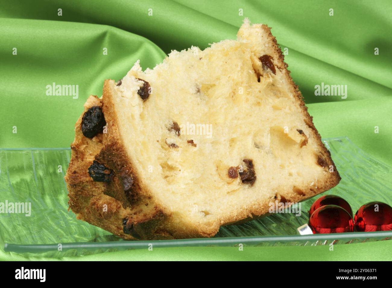 Panettone the italian Christmas fruit cake served on a transparent ...