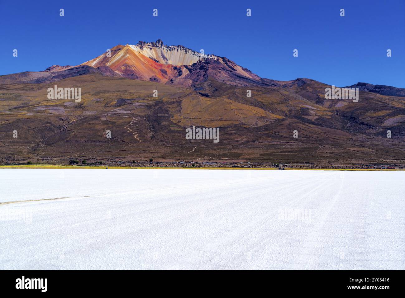 View of Salar de Uyuni Volcan Tunupa and the village of Coqueza in ...