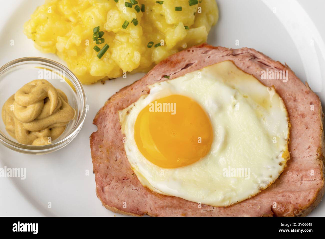 A typical Bavarian snack Leberkaese with potato salad Stock Photo - Alamy