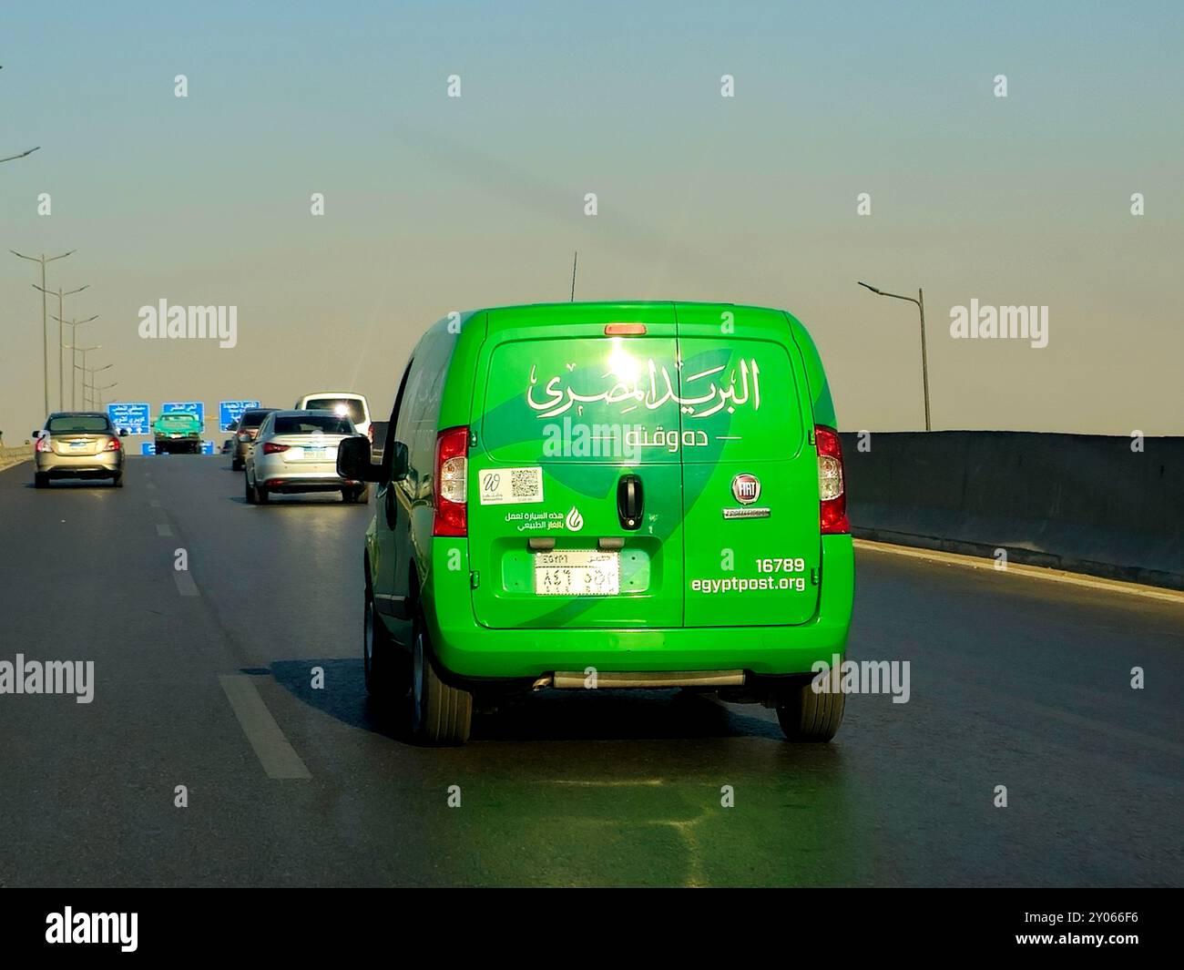 Cairo, Egypt, July 16 2024: Egyptian post delivery truck van mobile car service on the highway ...