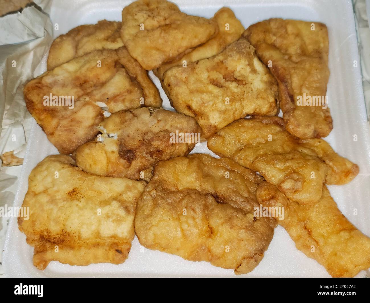 selective focus of tasty large fried Nile perch fish Lates niloticus ...