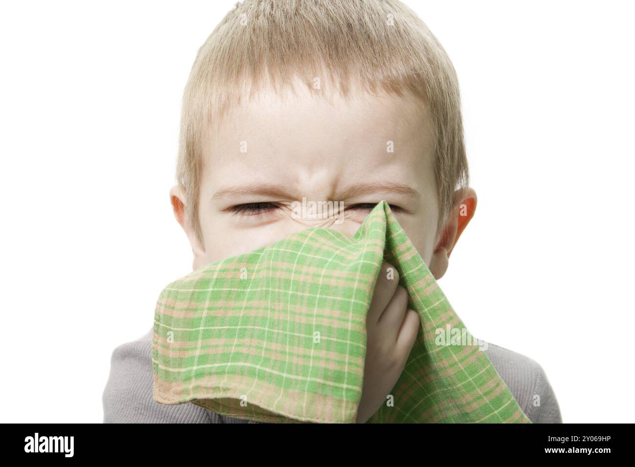 Human child cold flu illness tissue blowing nose Stock Photo - Alamy