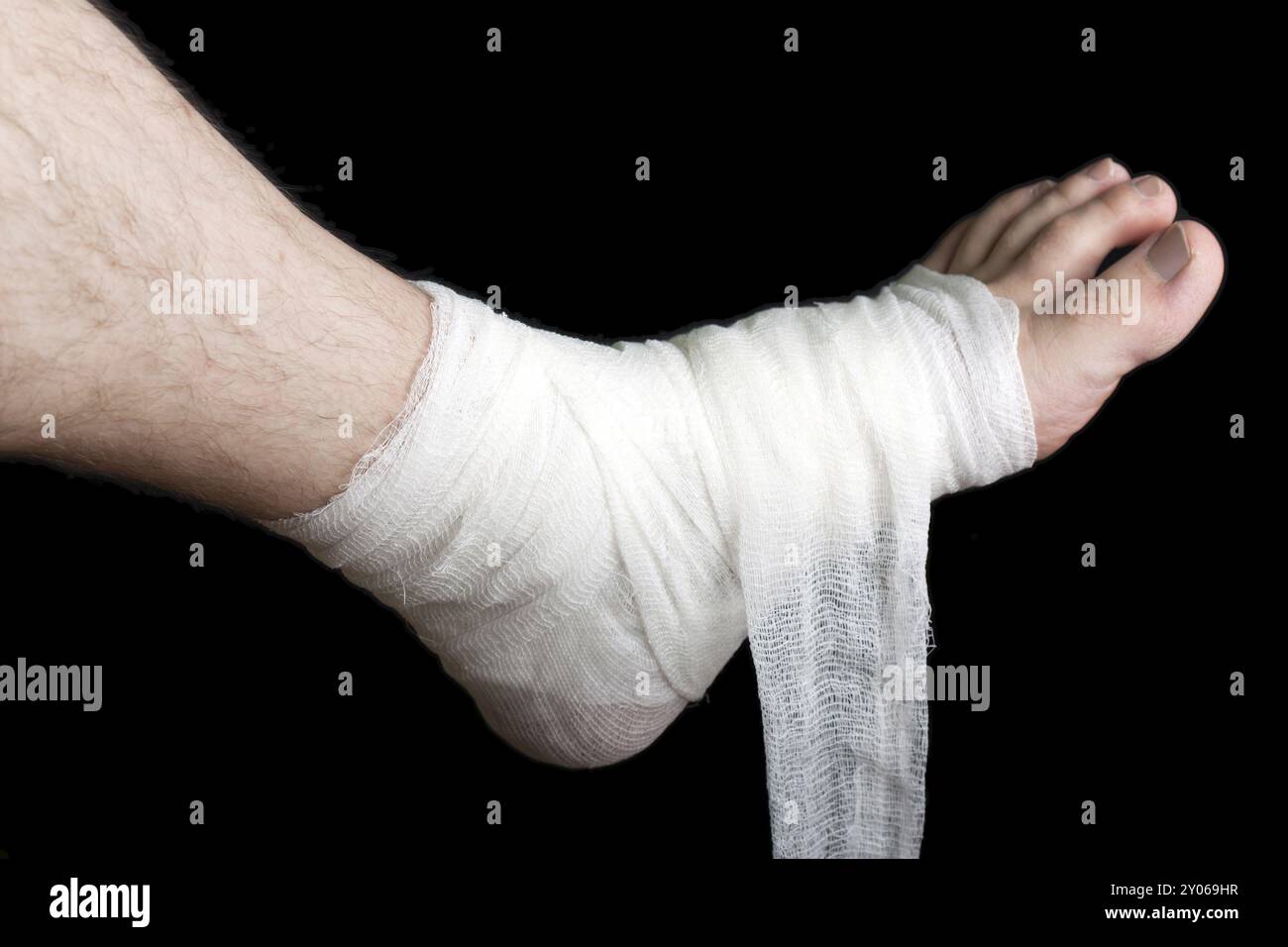 White medicine bandage on human injury foot Stock Photo - Alamy