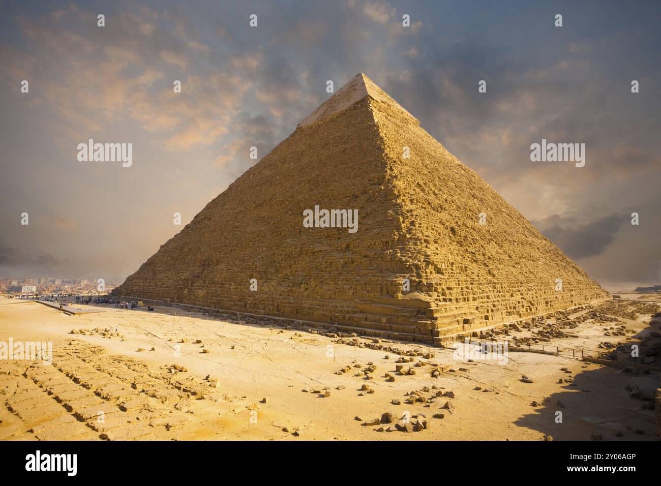 A beautiful fiery sky behind the Giza pyramid of Khafre in Cairo, Egypt ...