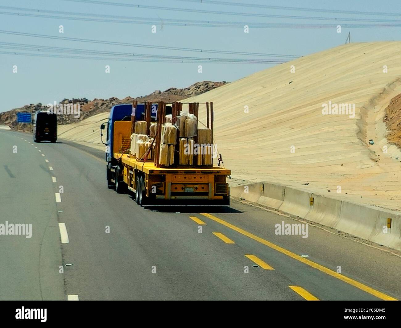 Makkah Madinah road, Saudi Arabia, June 25 2024: A big flatbed truck ...
