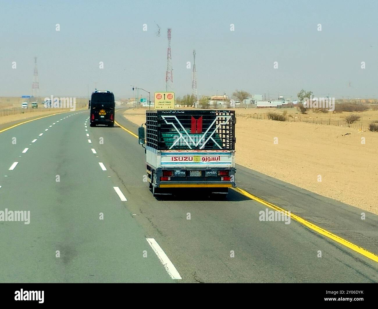 Makkah Madinah road, Saudi Arabia, June 25 2024: Isuzu transportation ...
