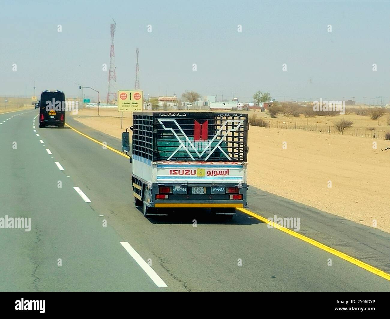 Makkah Madinah road, Saudi Arabia, June 25 2024: Isuzu transportation ...
