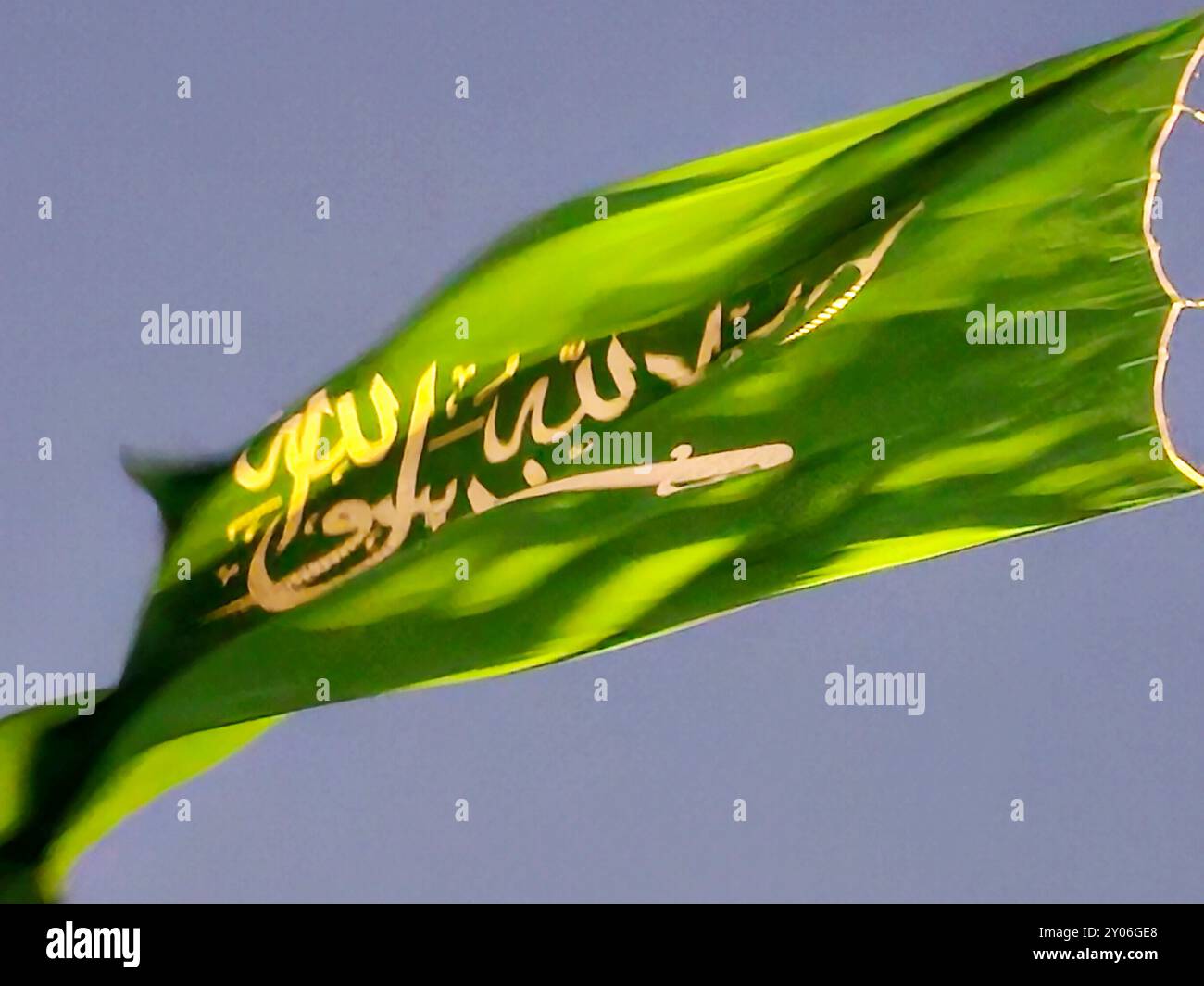 The national flag of Saudi Arabia kingdom, a green background with ...