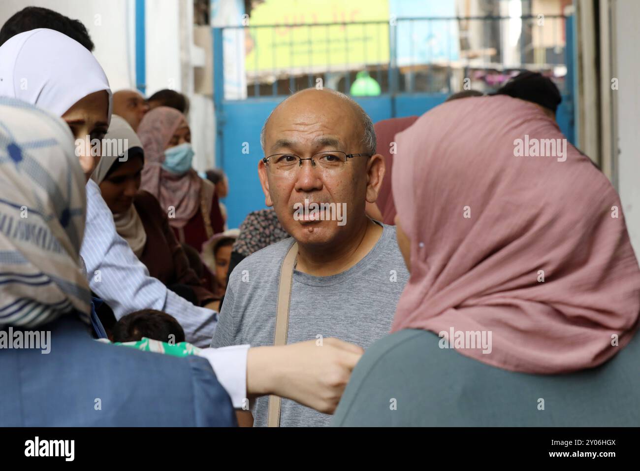 Dr. Akihiro Seita, UNRWA Director of Health, inspects polio vaccination ...