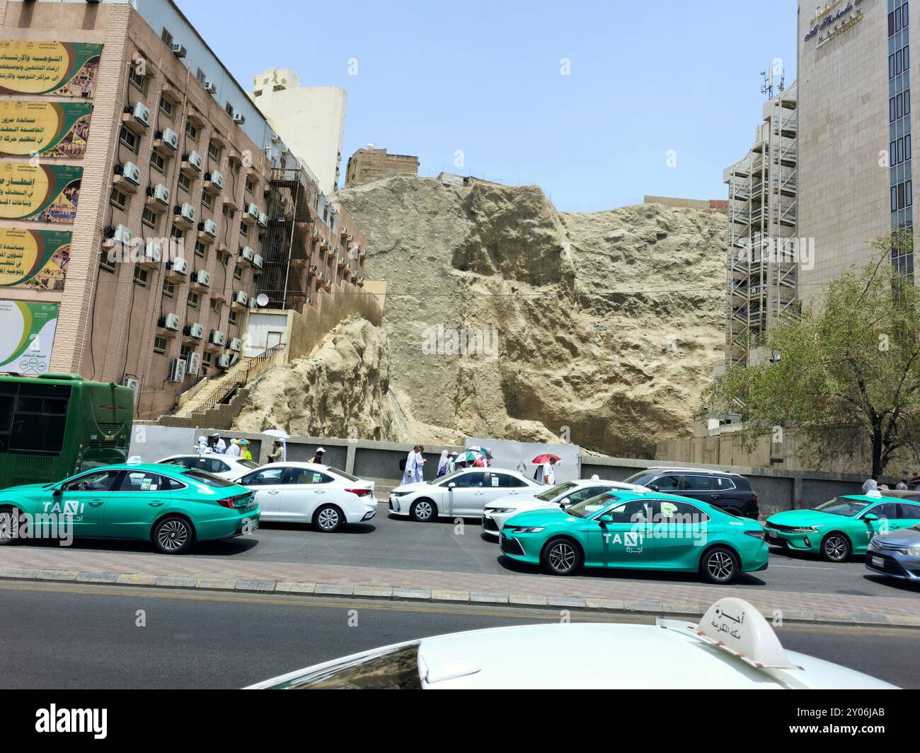 Mecca, Saudi Arabia, June 4 2024: Mecca Makkah Taxi, used to transport Hajj pilgrims inside and ...