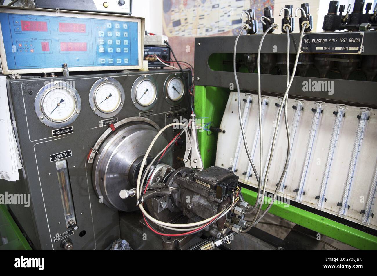 Close-up high pressure diesel fuel pump test bench on work Stock Photo ...