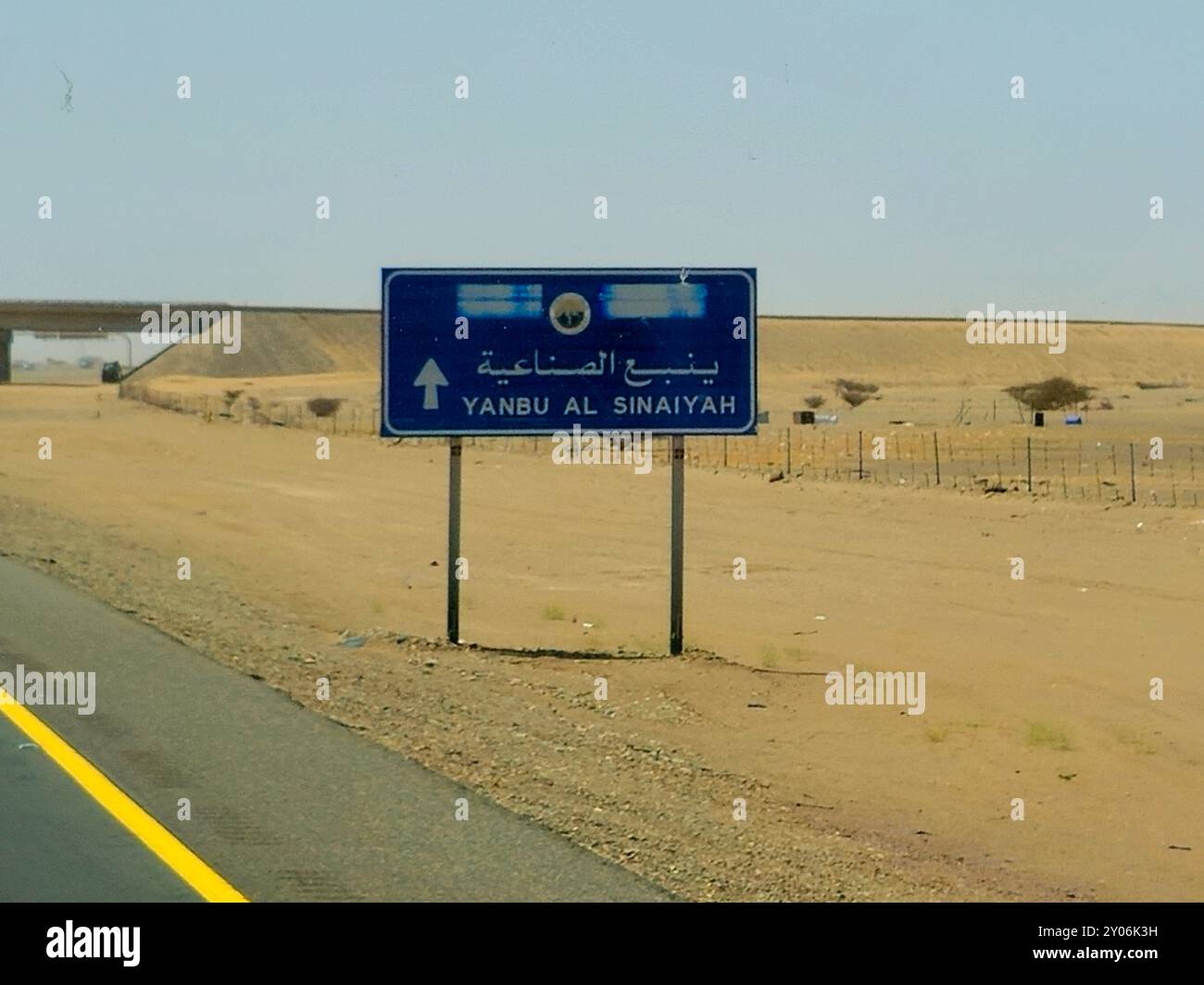 Makkah Madinah road, Saudi Arabia, June 25 2024: The road sign board of Yanbu Al Sinaiyah at ...